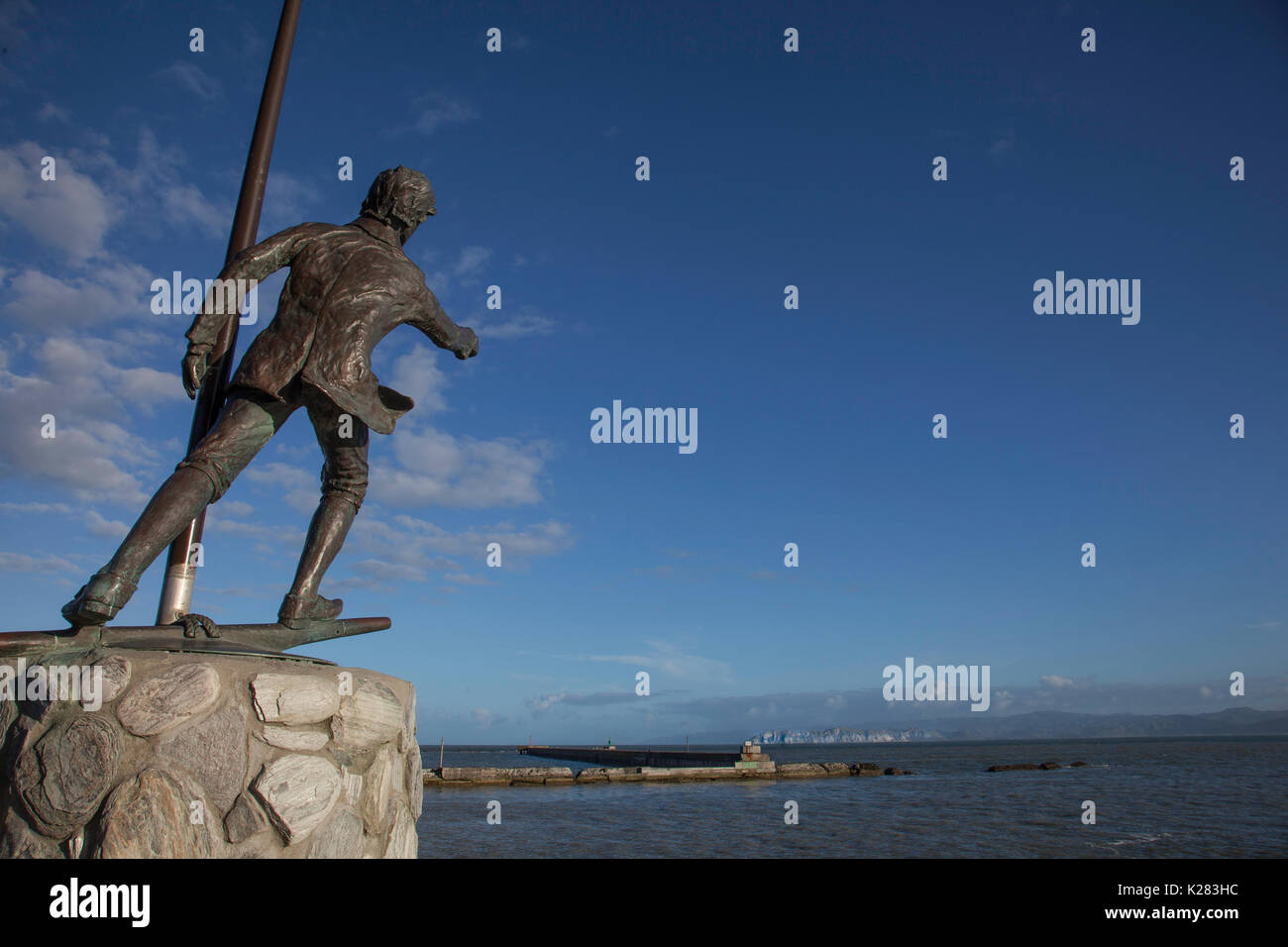 Statue of Nicholas Young, Young Nick, pointing at the headland named ...