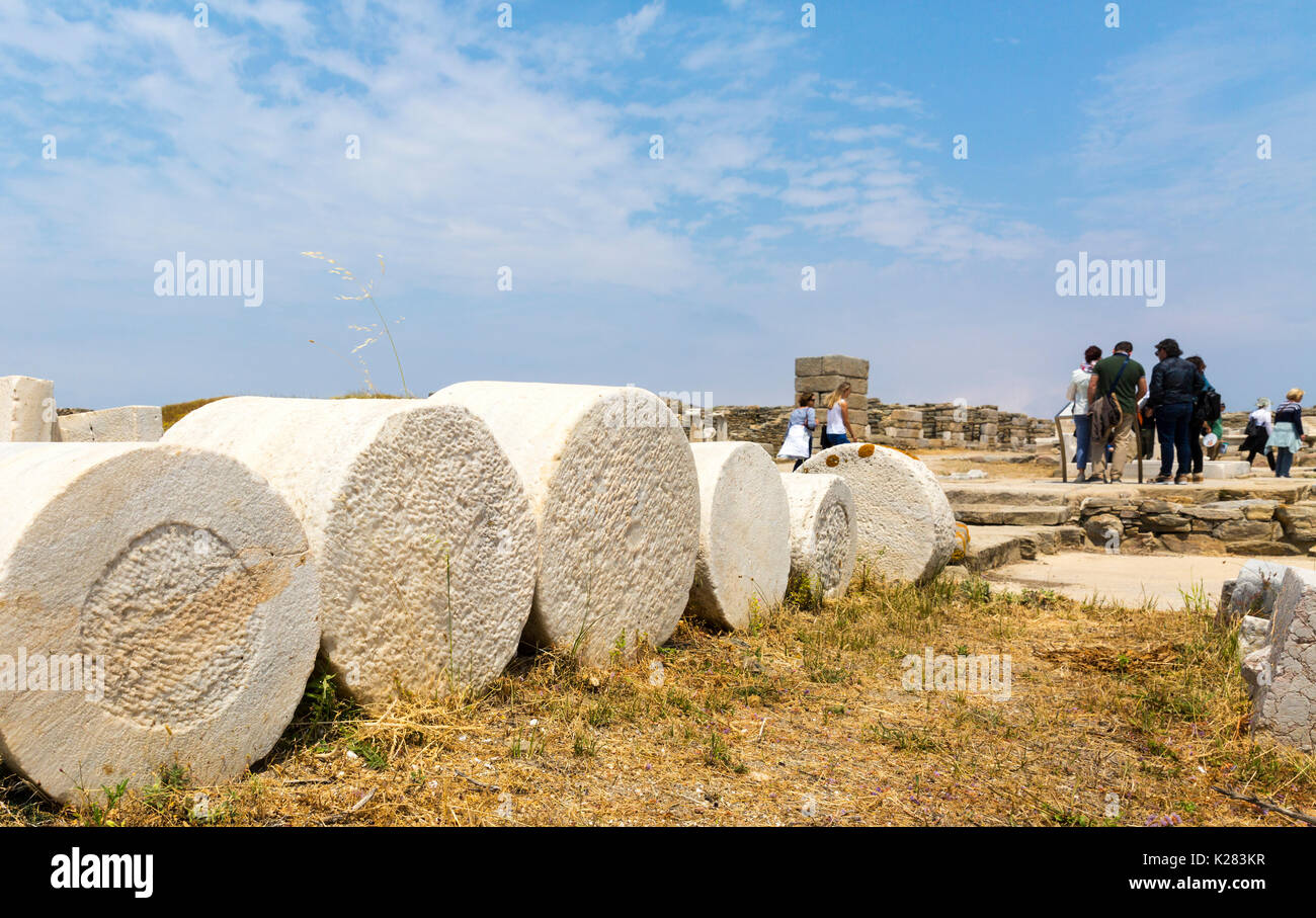 Cylindrical column blocks lying amidst the ancient ruins of Delos ...