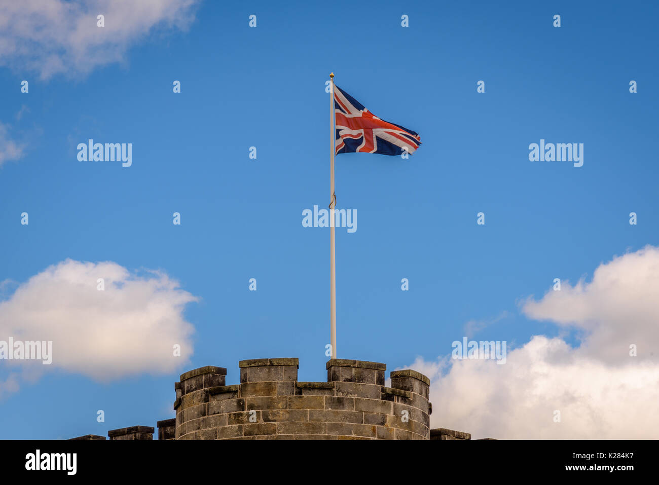 British flag against stone wall hi-res stock photography and images - Alamy
