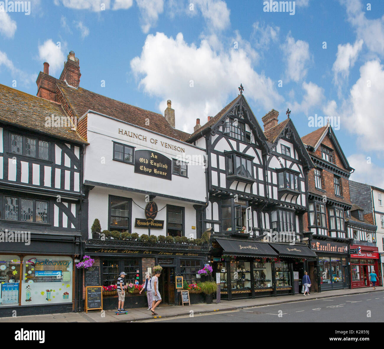 Historic buildings in diversity of architectural styles, under blue sky ...