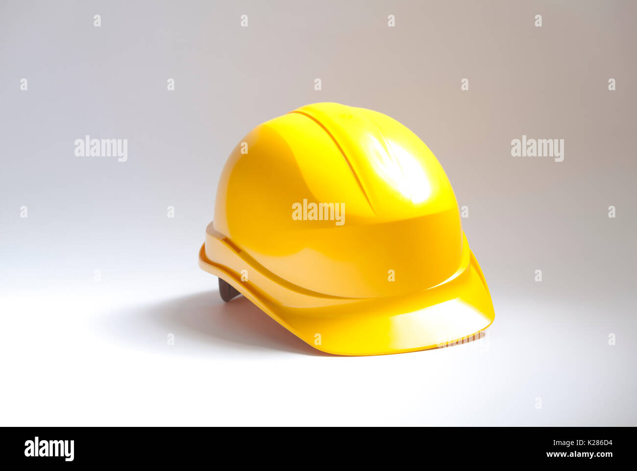 Yellow safety helmet Stock Photo - Alamy