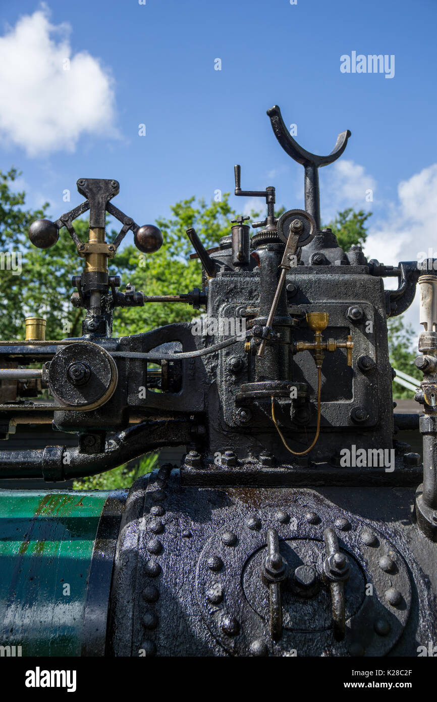 Detail of old vintage steam machinery with valves, pipes and mechanics ...