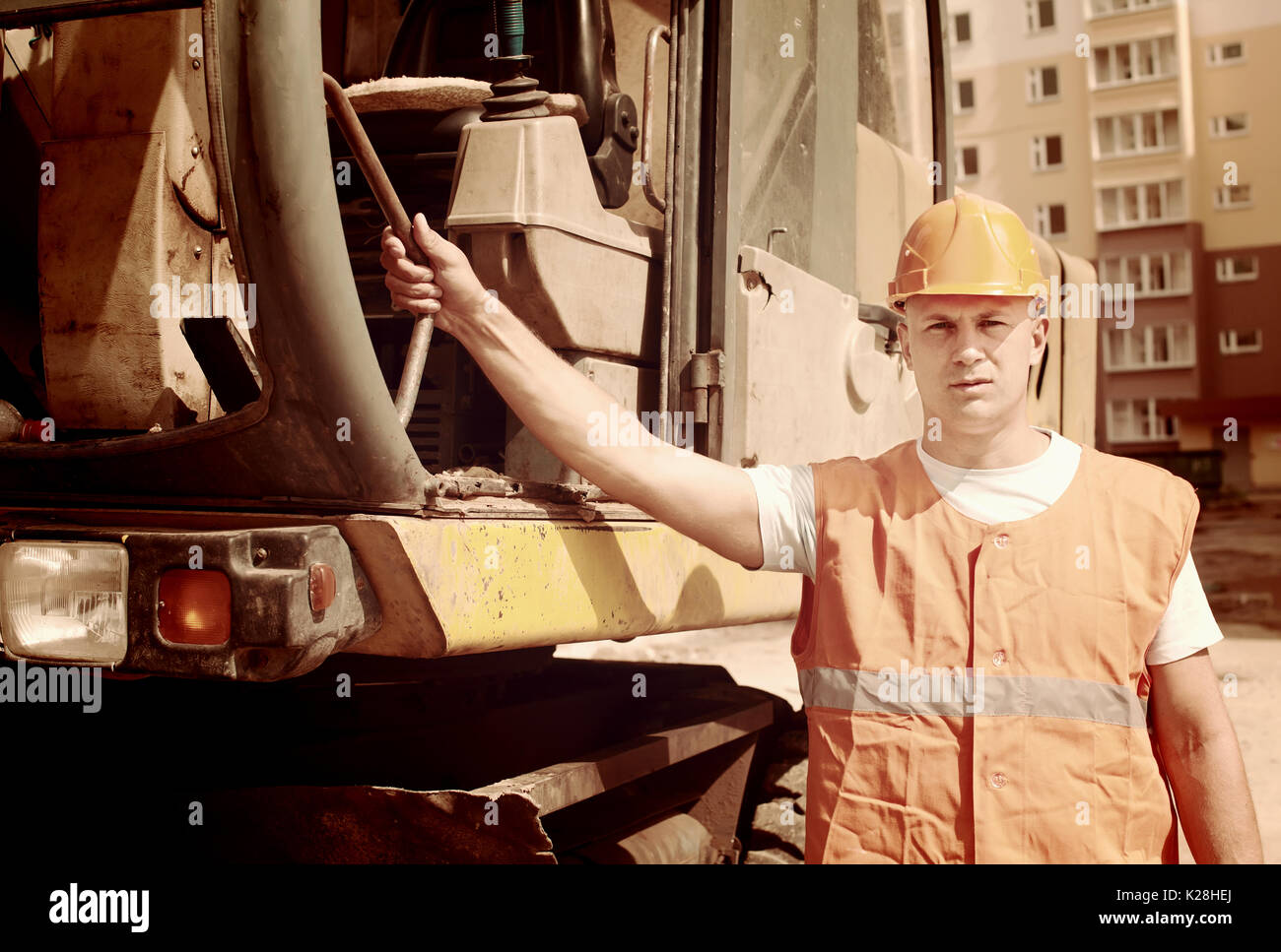Portrait of tractor operator at construction site Stock Photo - Alamy