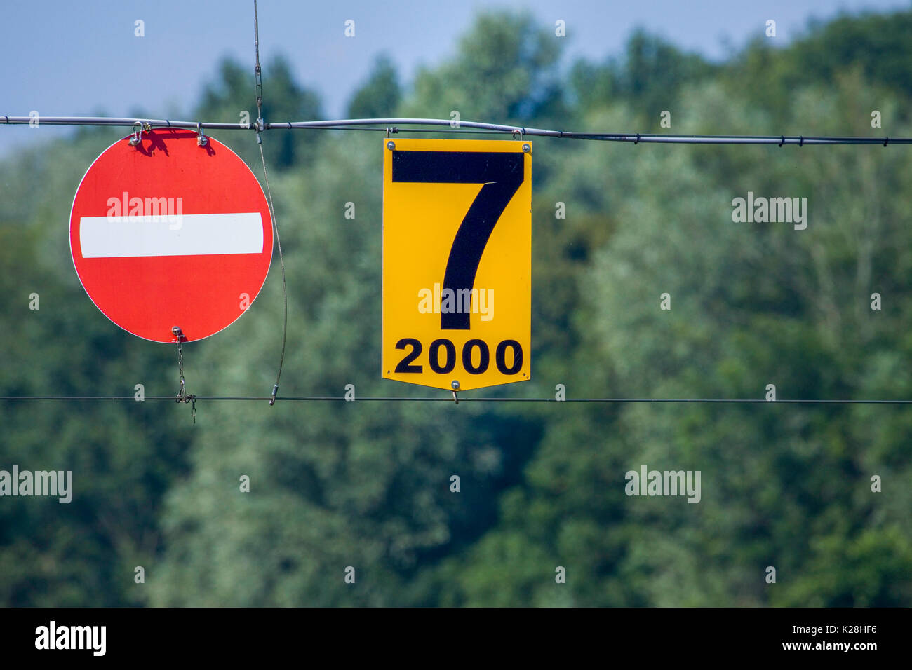 Signs above the race track Stock Photo - Alamy