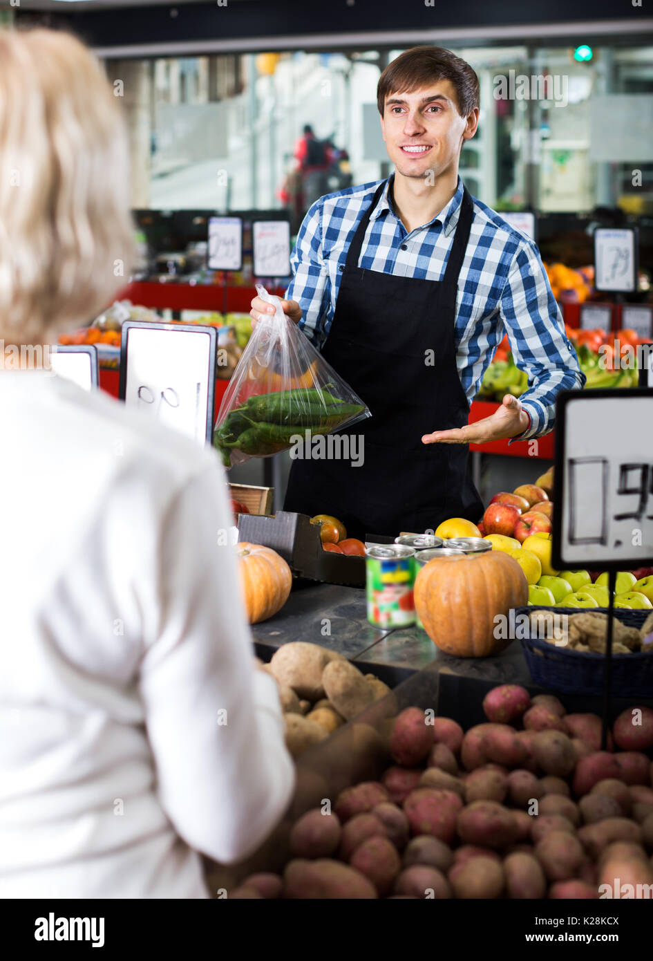 Ordinary cheerful smiling customer hi-res stock photography and images ...