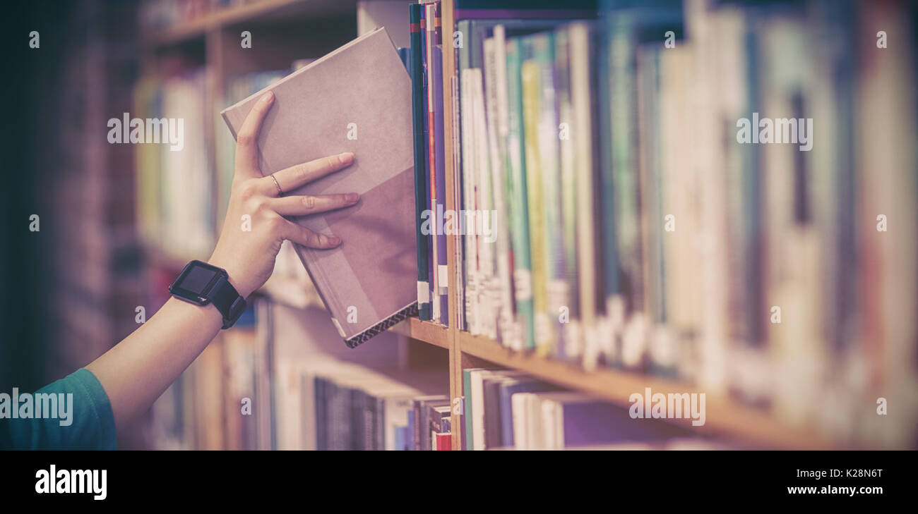 Picking up book hi-res stock photography and images - Alamy