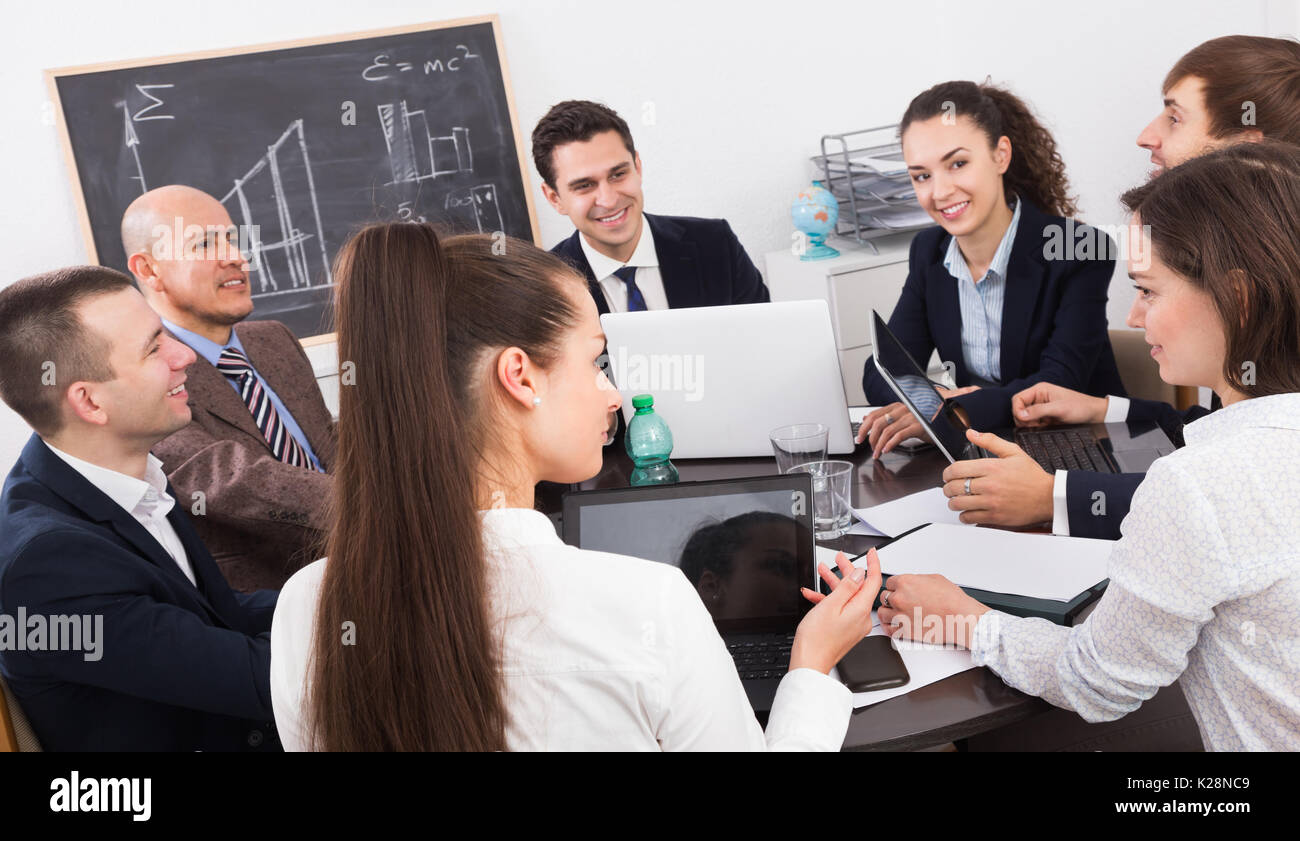 Chief with experienced professional officials discussing preparing the ...