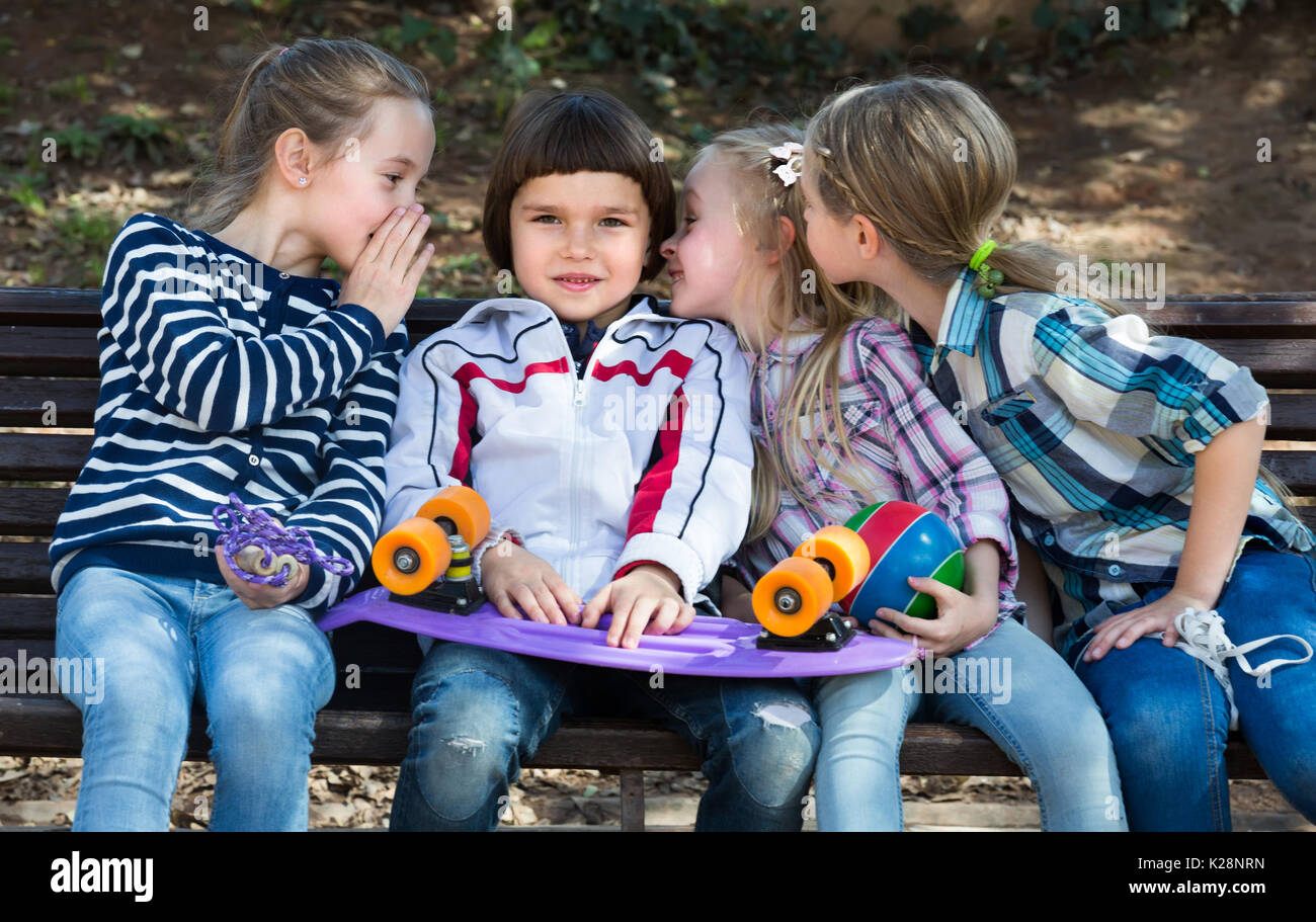 School girls talking secrets hi-res stock photography and images - Alamy