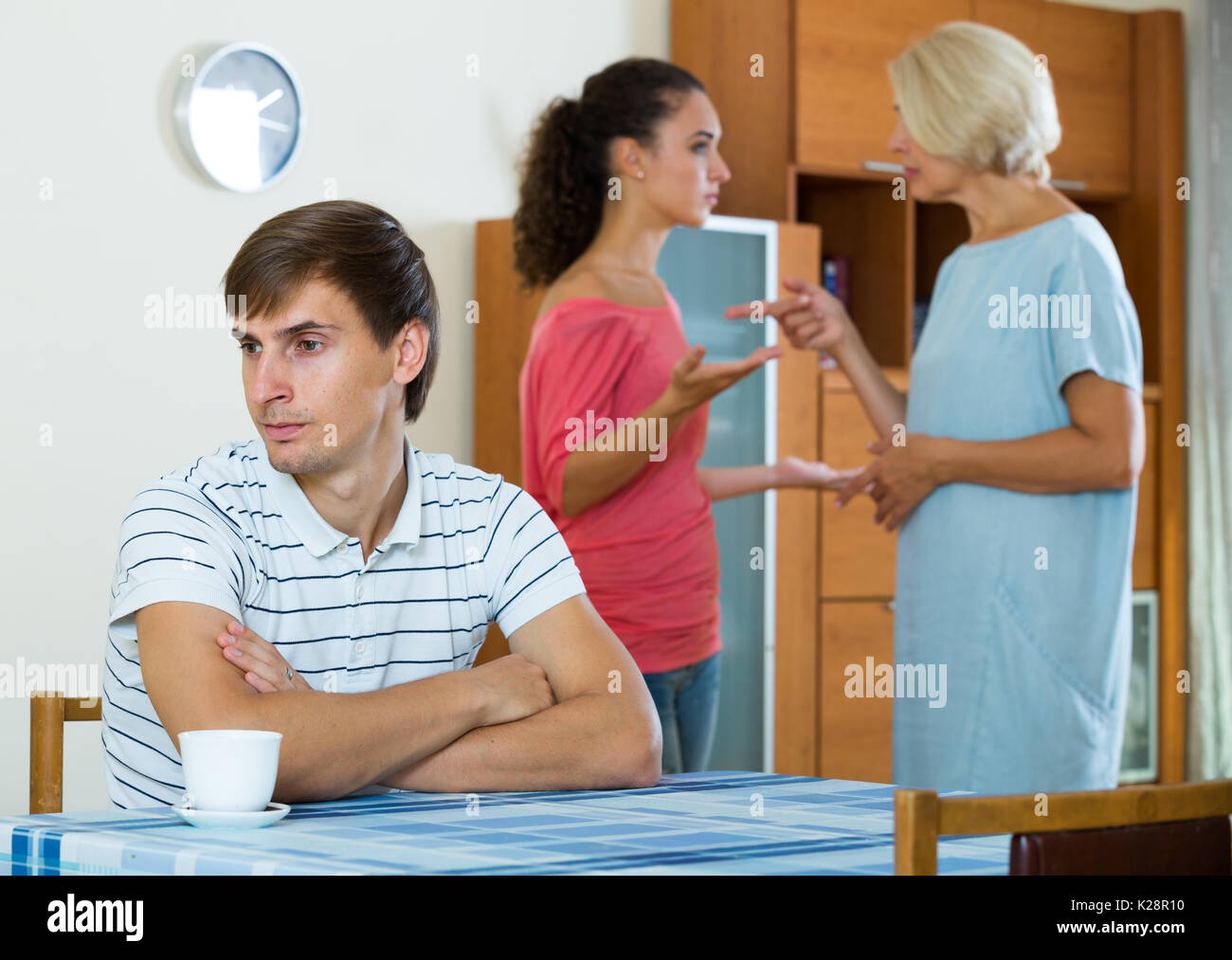 Young man suffering of domestic fight between family members Stock ...