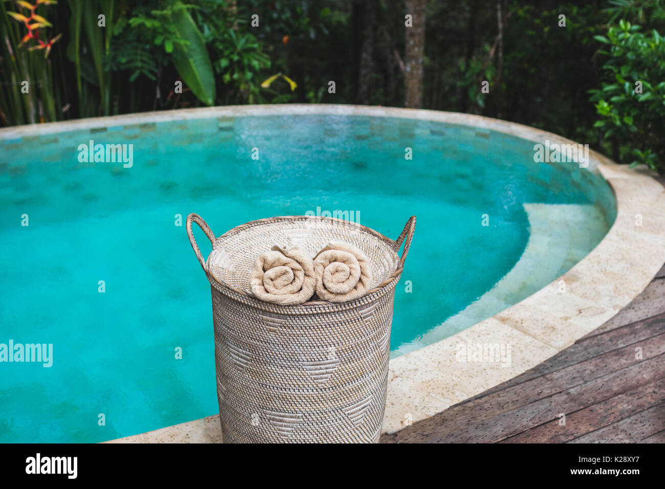 Pool towel in wicker basket hi-res stock photography and images - Alamy
