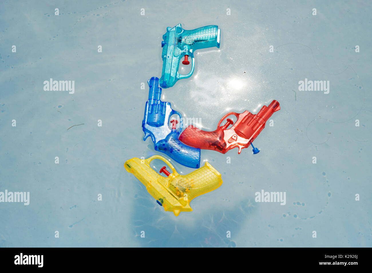 Water pistols in padding pool Stock Photo - Alamy