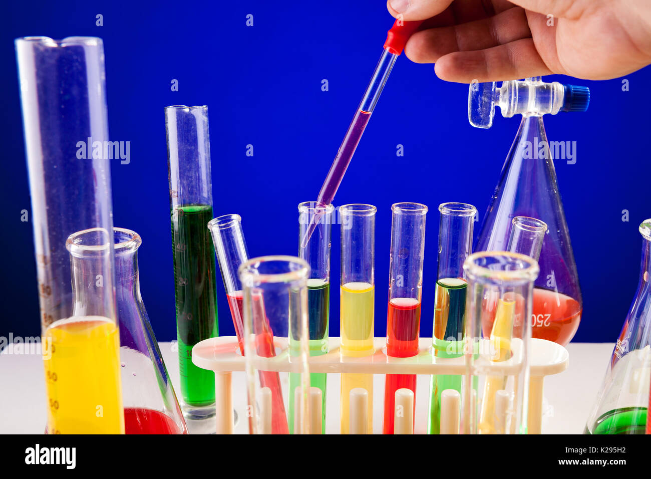Person hand working in chemistry lab Stock Photo - Alamy