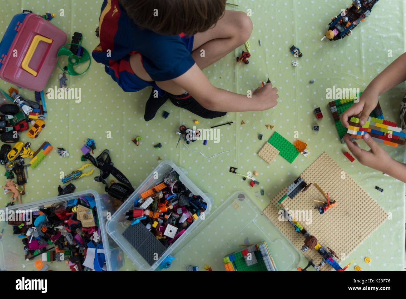 Boys playing lego hi-res stock photography and images - Alamy