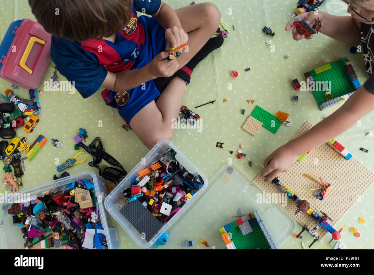 Boys playing lego hi-res stock photography and images - Alamy