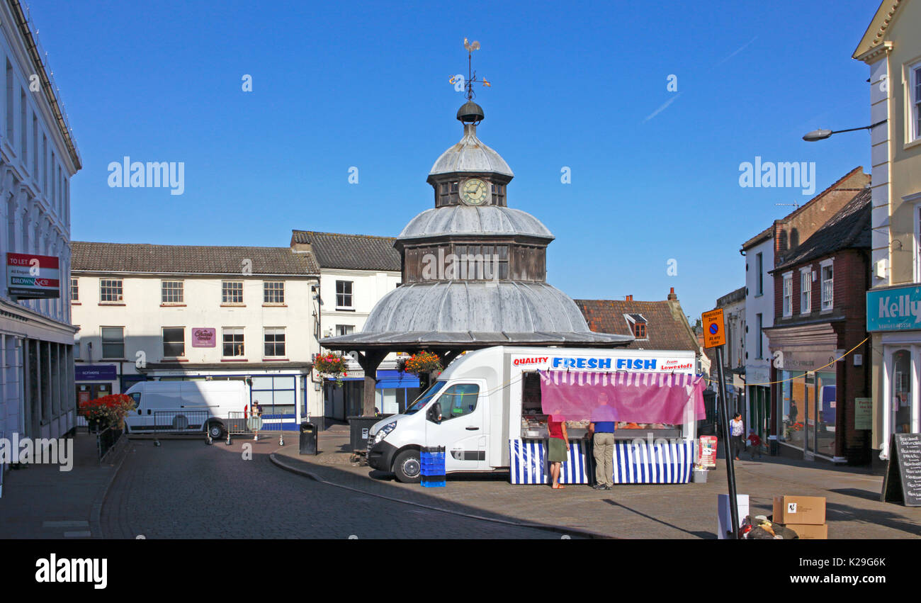 A view of the Market Cross with fresh fish van on market day at the ...
