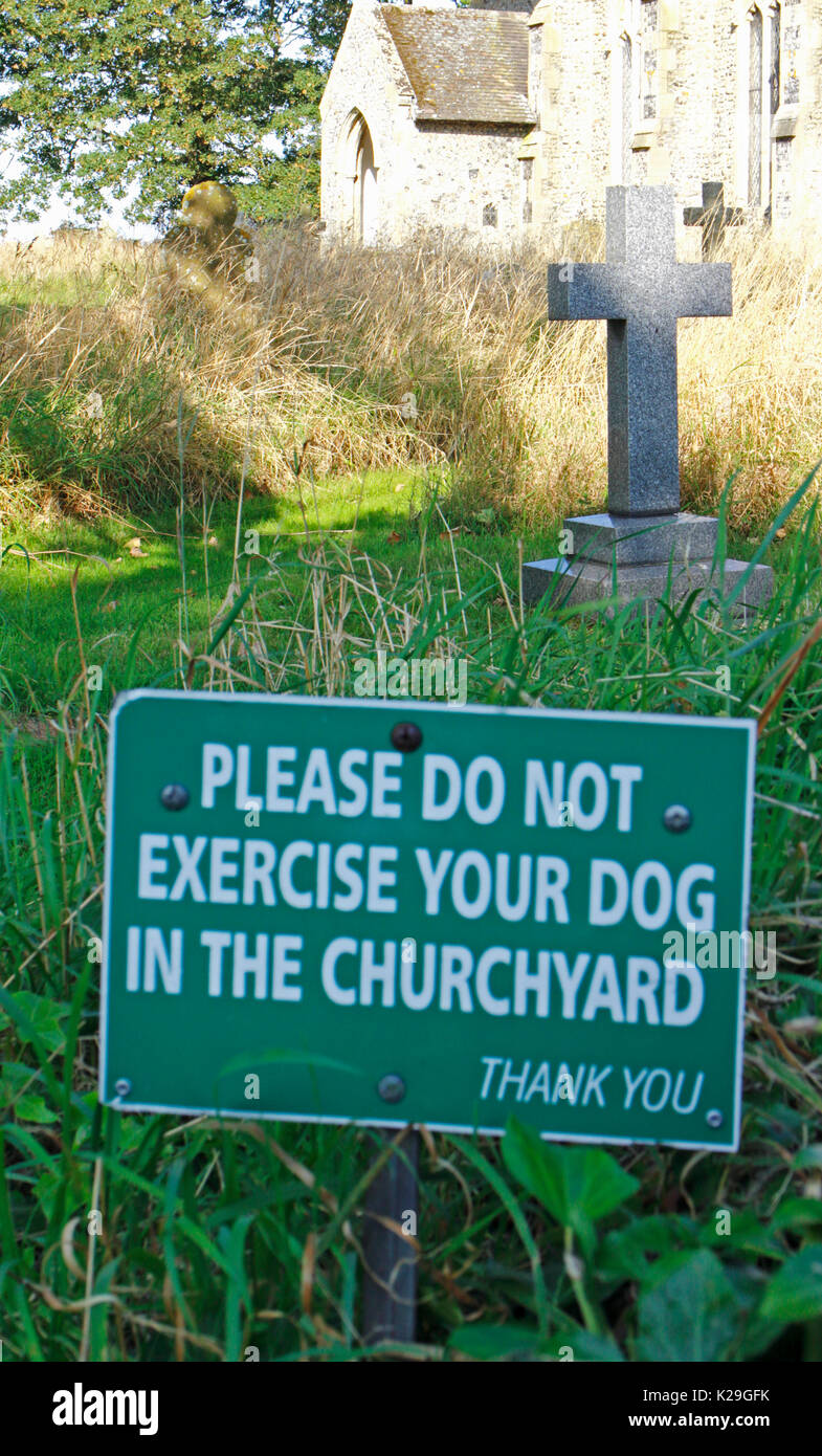 A Please do not Exercise your Dog sign in the churchyard at Swafield ...