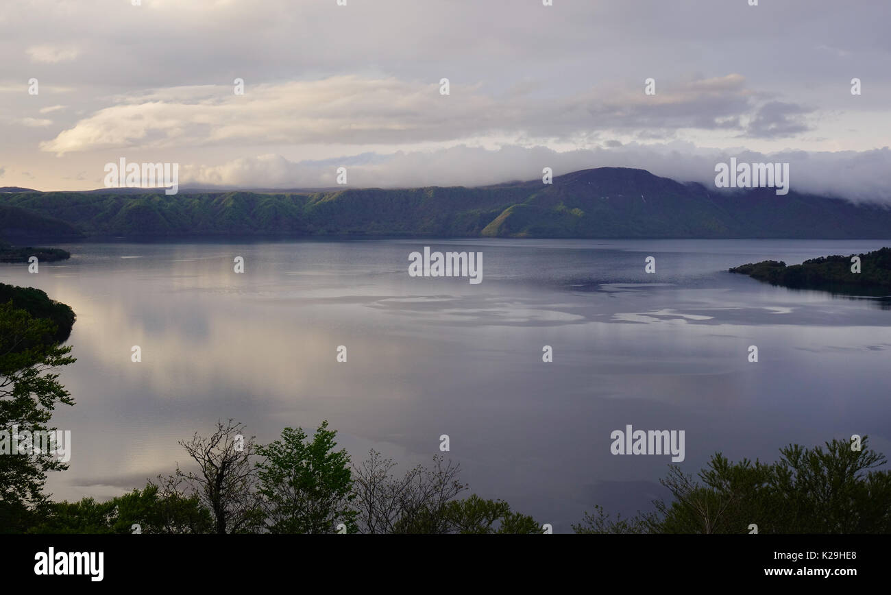 View of Lake Towada at sunset in Aomori, Japan. Lake Towada-ko is at ...