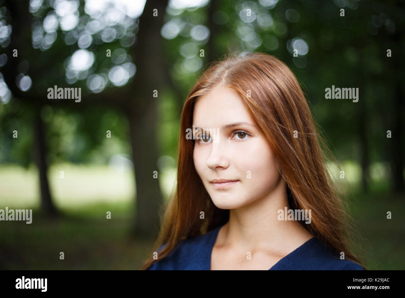 Caucasian Teen Girl With Long Brunette Hair And Brown Eyes Hi Res Stock