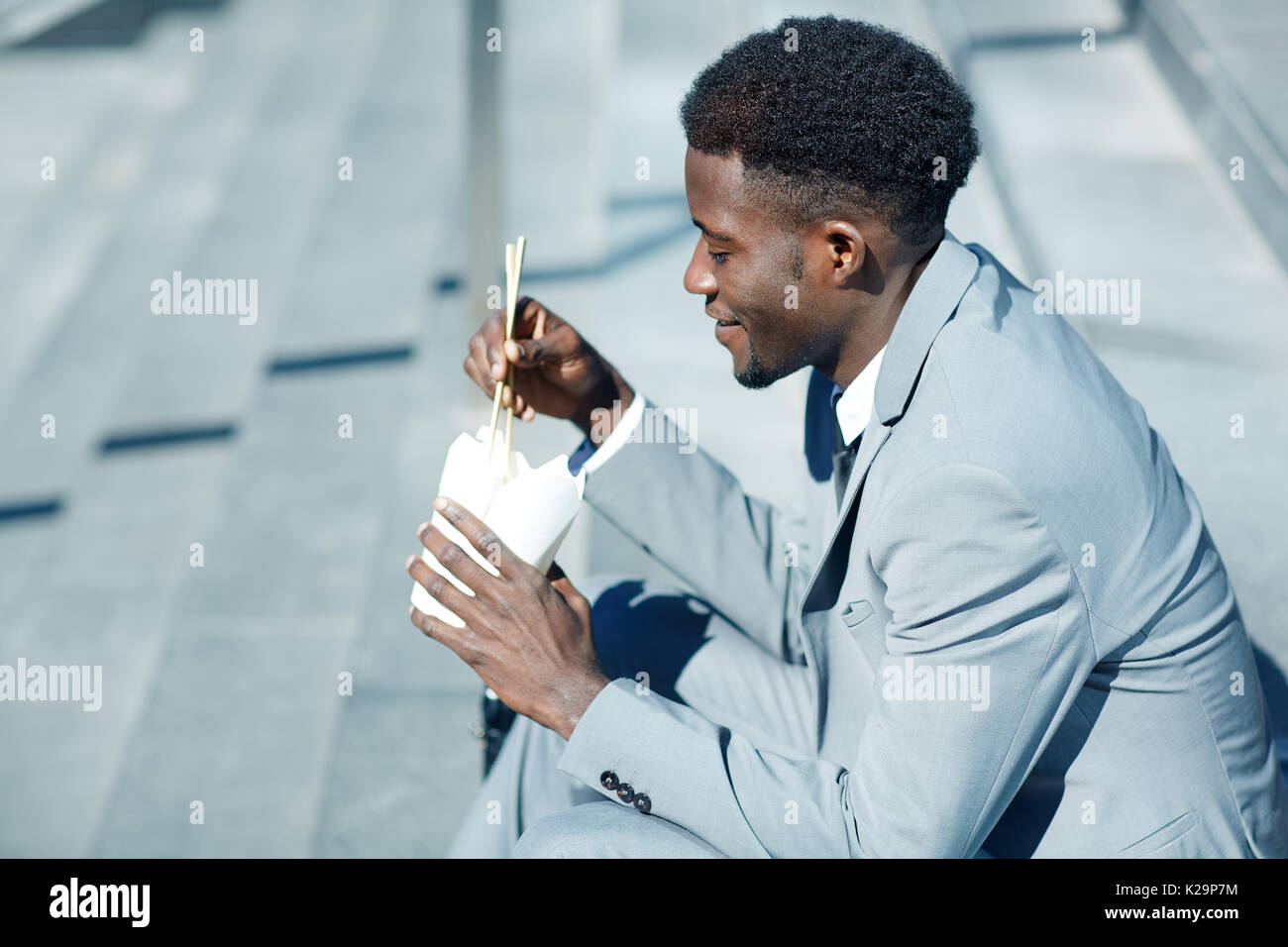 Young adult after eating fast food hi-res stock photography and images ...