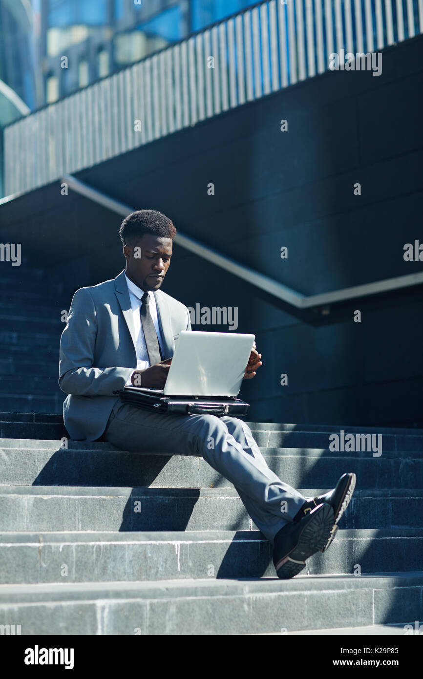 African business man stairs hi-res stock photography and images - Alamy