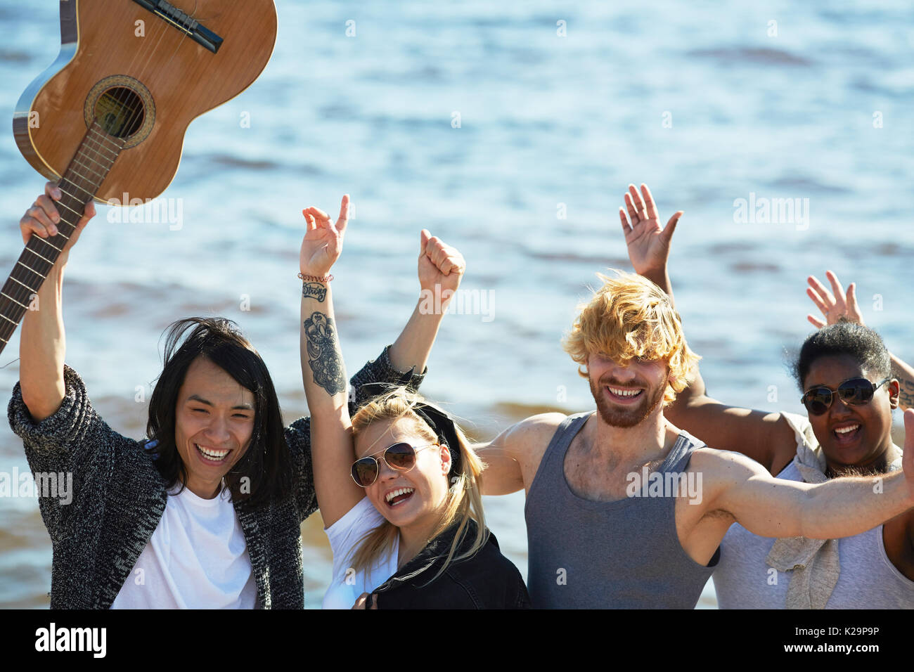 Group Portrait of Smiling Friends Stock Photo - Alamy