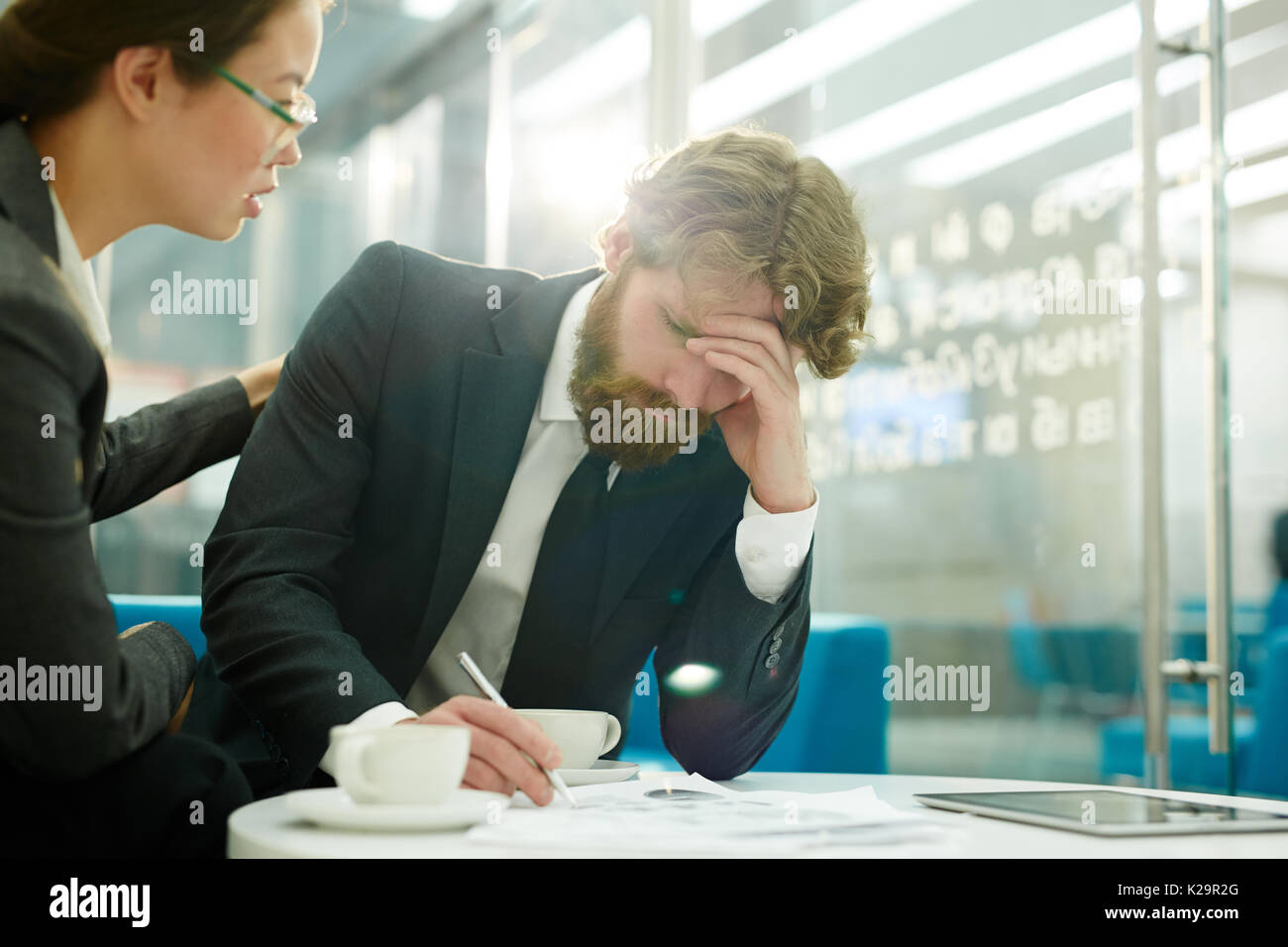 Comforting colleague hi-res stock photography and images - Alamy