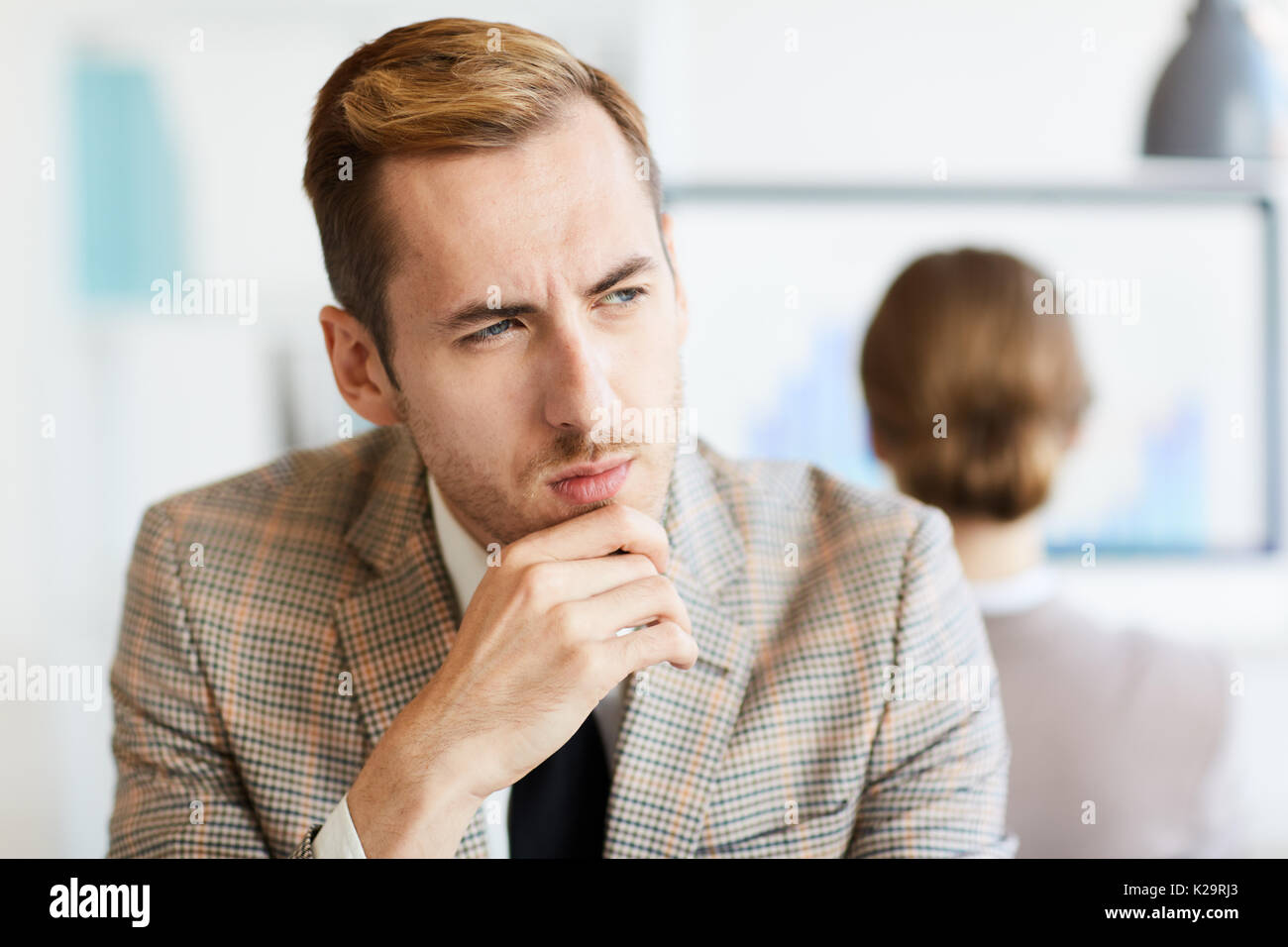 Young adult man contemplating hi-res stock photography and images - Alamy