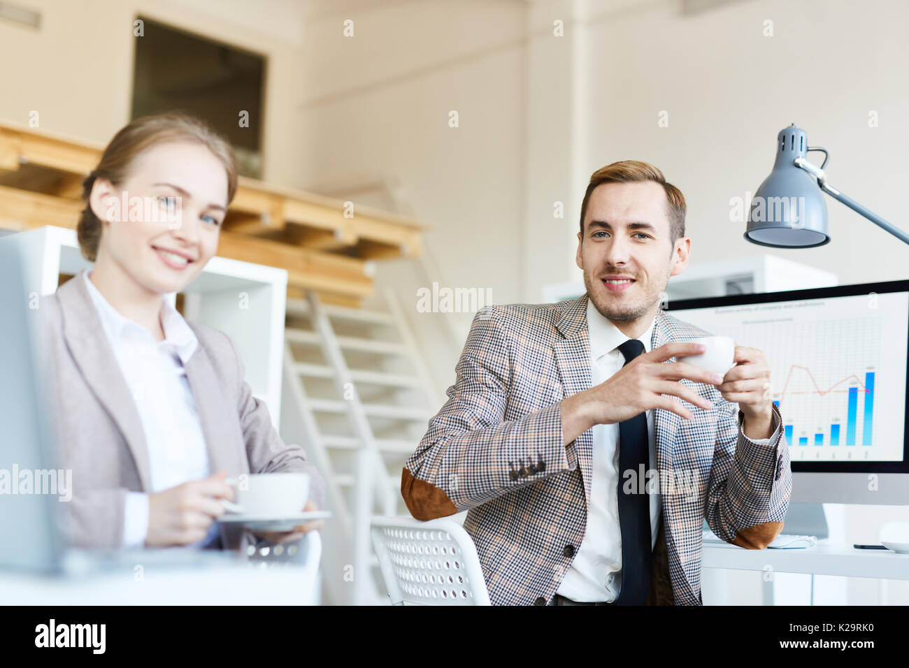 Having tea break Stock Photo - Alamy