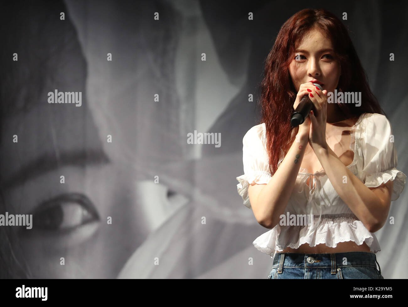 S. Korean singer Hyun Ah South Korean singer Hyun Ah greets reporters ...