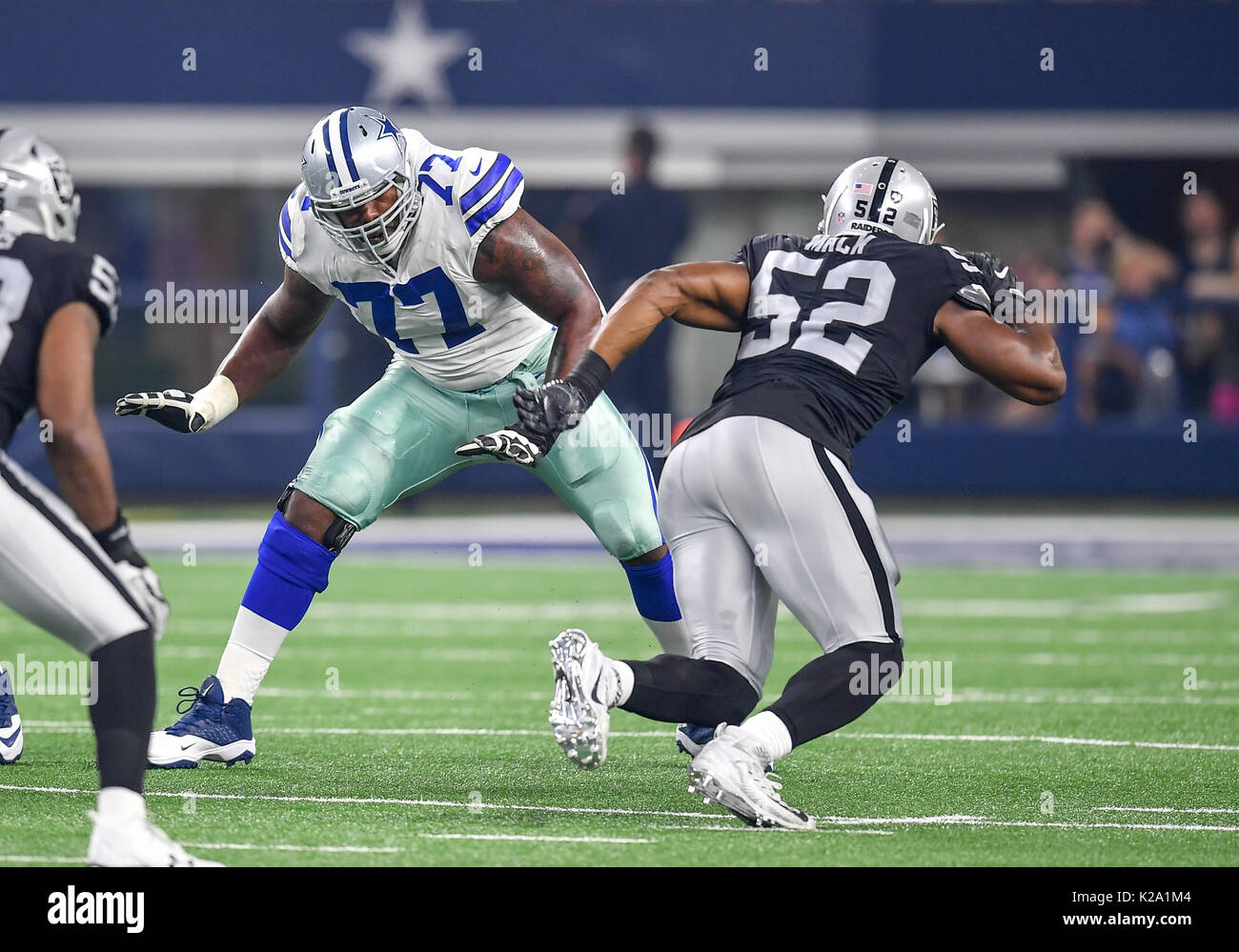 August 26th, 2017:.Dallas Cowboys tackle Tyron Smith (77) and Oakland ...