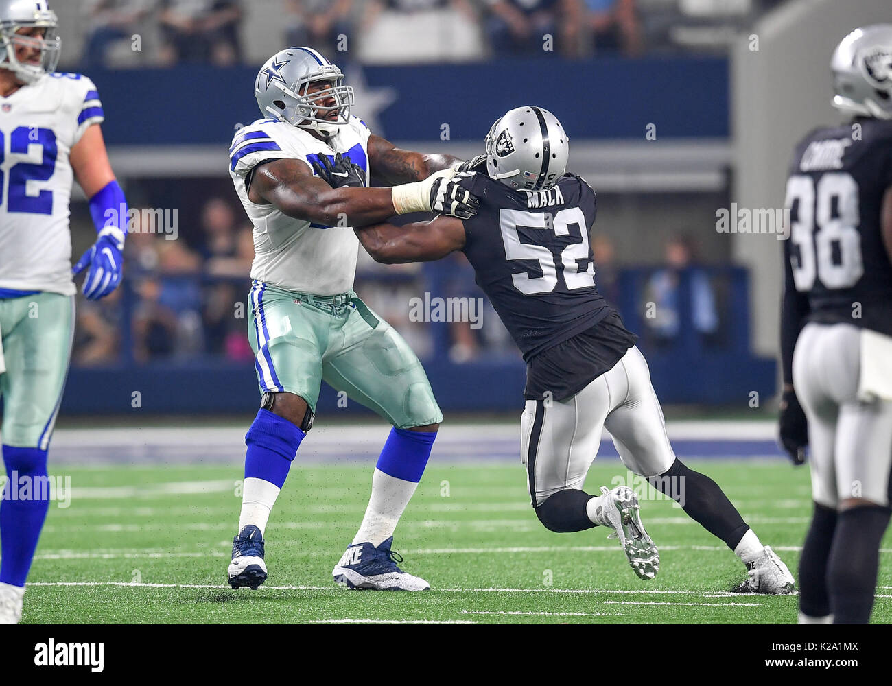 August 26th, 2017:.Dallas Cowboys tackle Tyron Smith (77) and Oakland ...