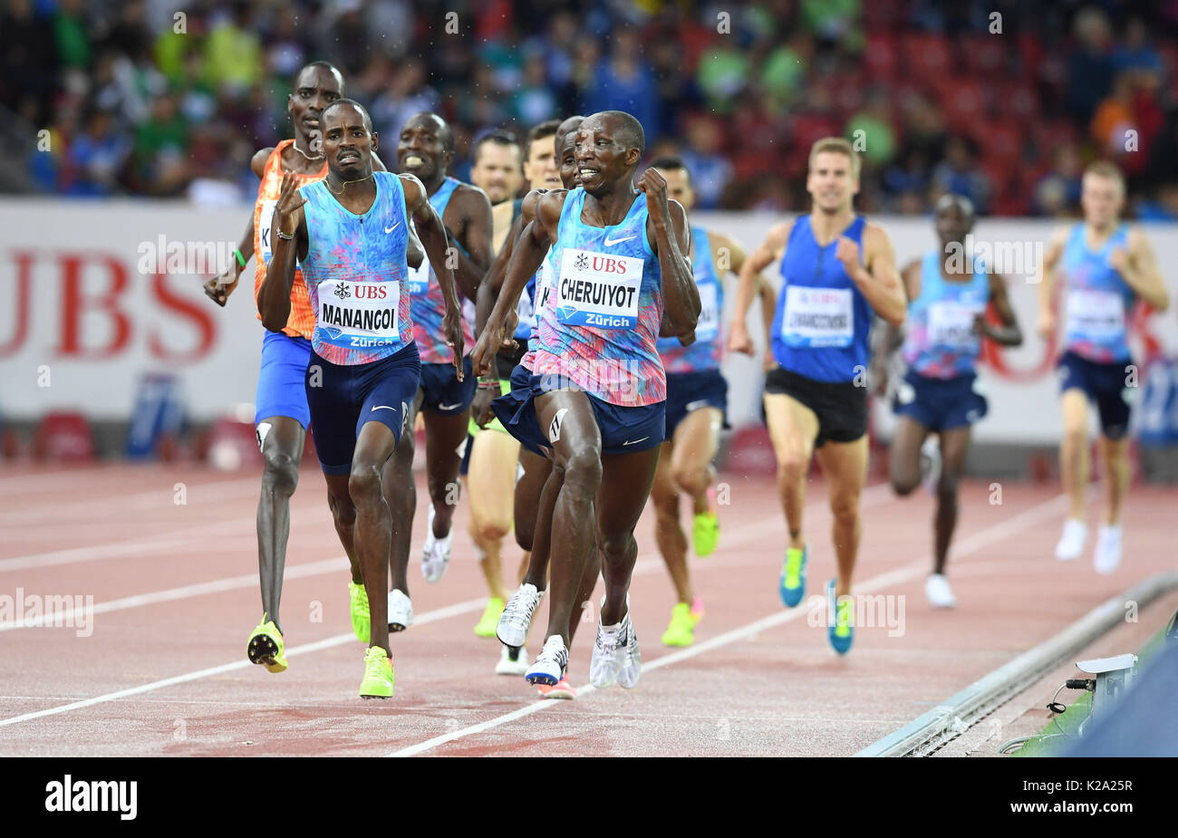 Timothy Cheruiyot (KEN) defeats Elijah Manangoi (KEN) to win the 1,500m ...