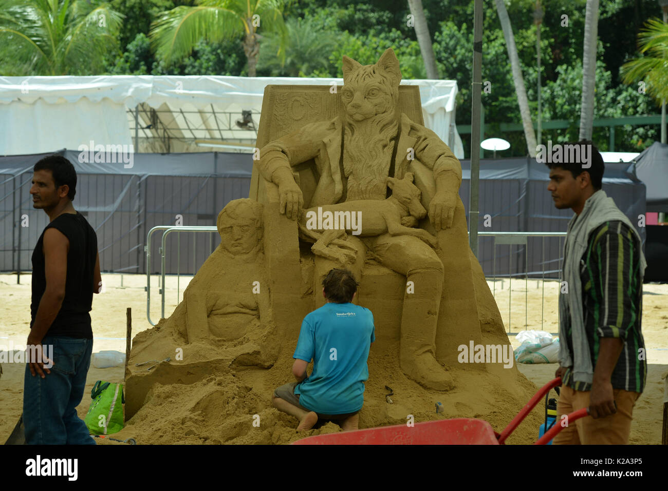 Singapore. 30th Aug, 2017. Sand sculpture master works on creations at ...