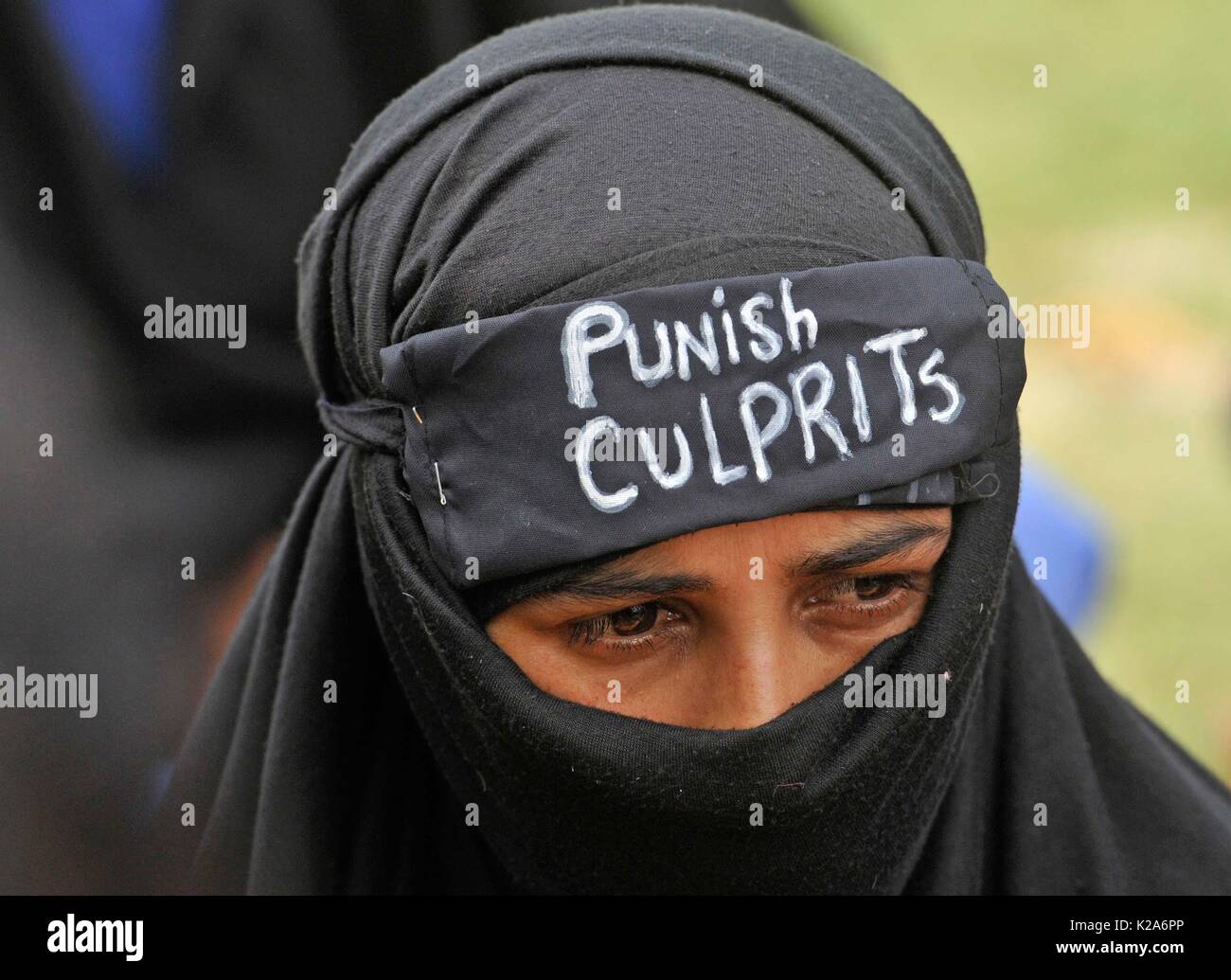 Srinagar, Kashmir. 30th Aug, 2017. Relative of a disappeared person ...