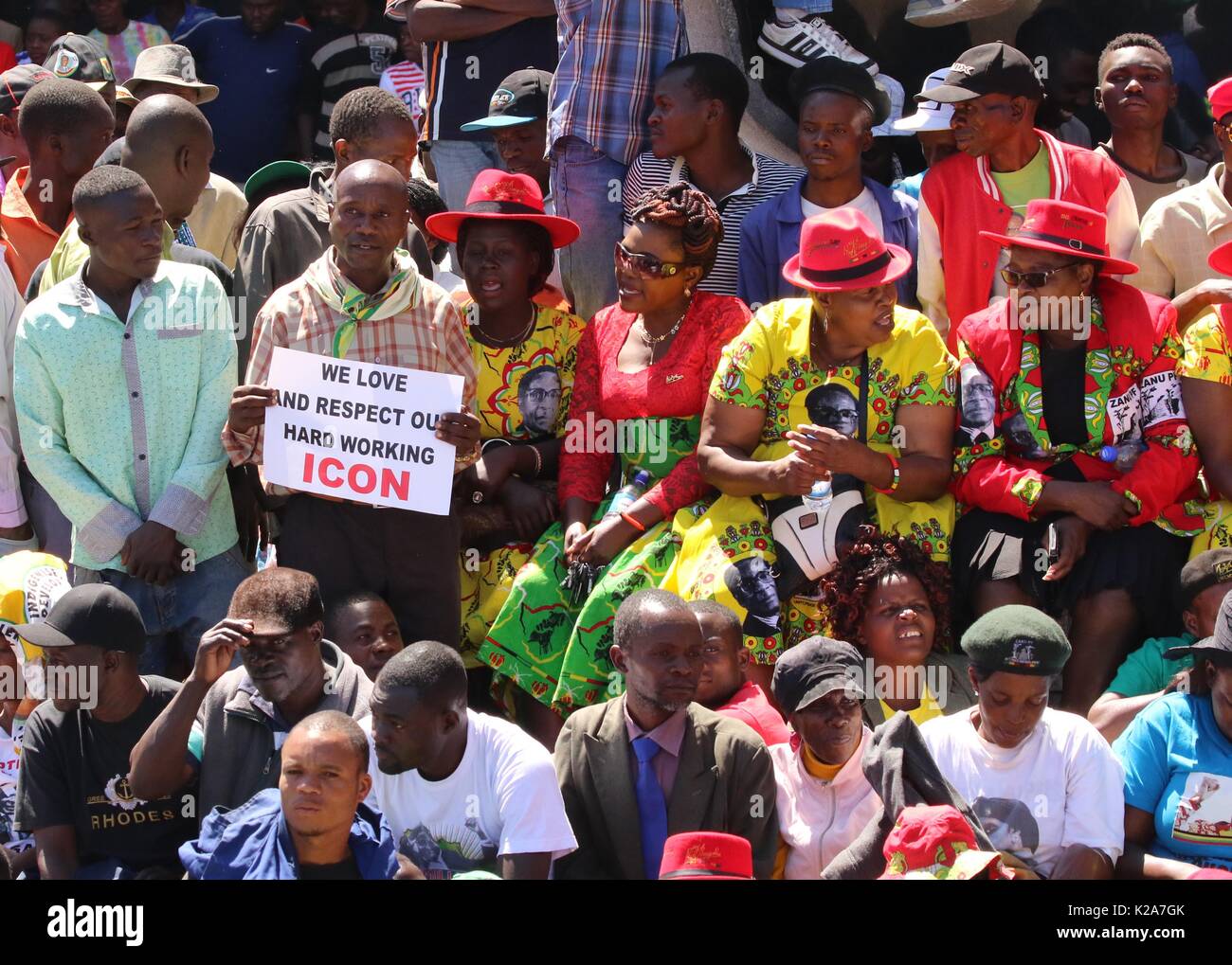 Harare. 30th Aug, 2017. People take part in a rally to support the ...