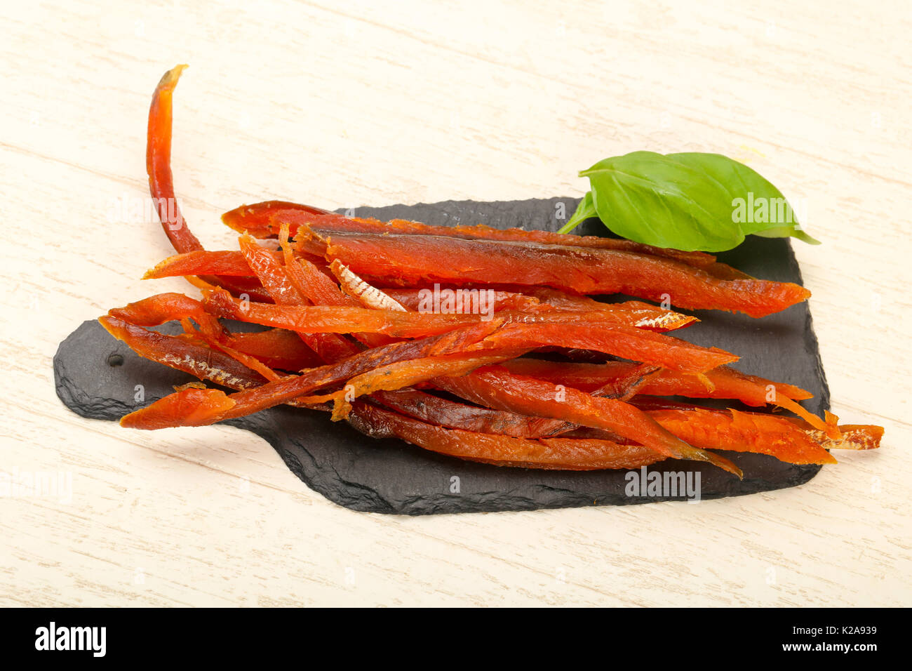 Salmon dry sticks snack Stock Photo - Alamy