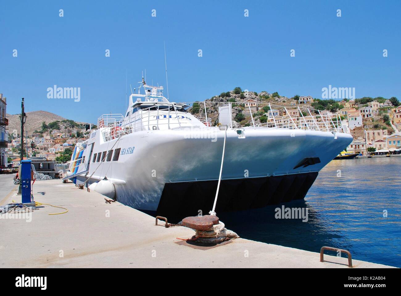 High speed catamaran ferry Tilos Sea Star moored at Yialos harbour on ...