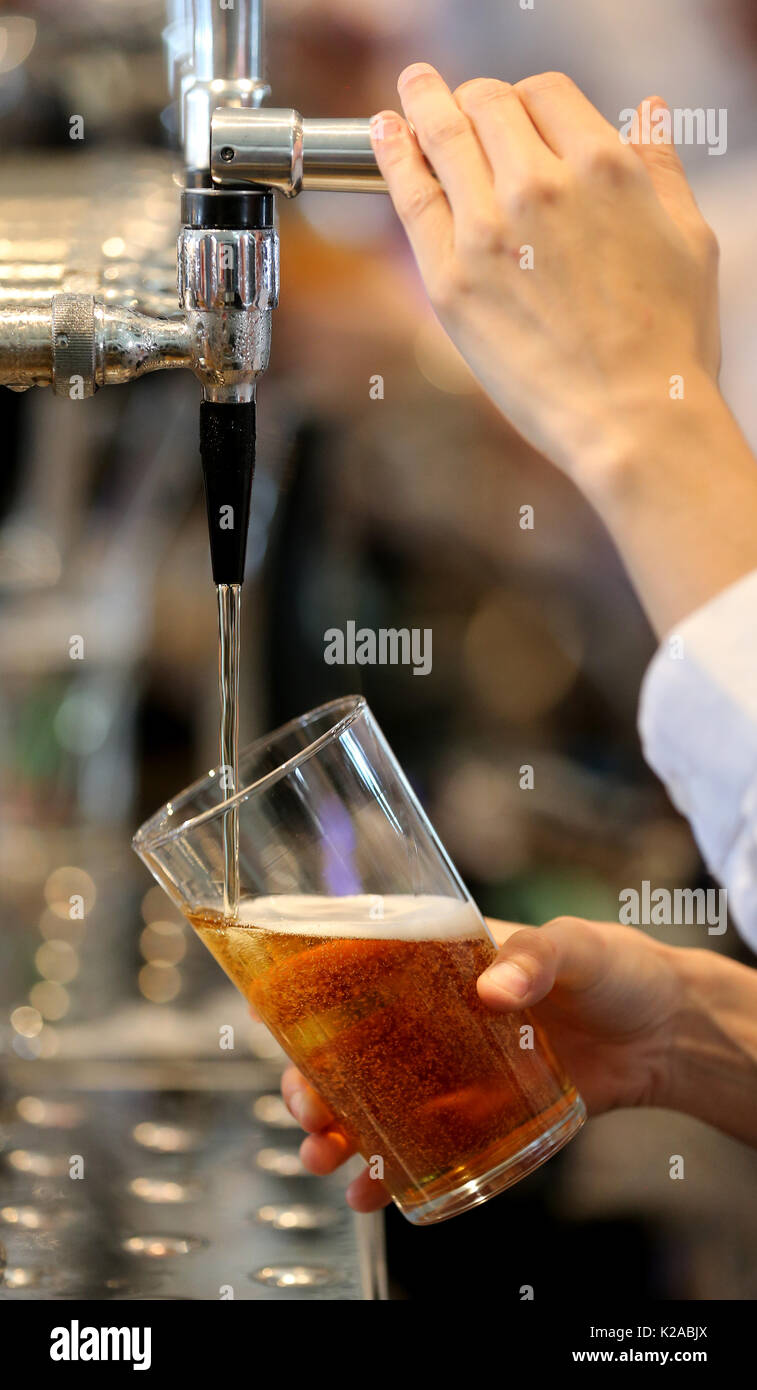 A pint is poured at JD Wetherspoon's Royal Victoria Pavillion in ...