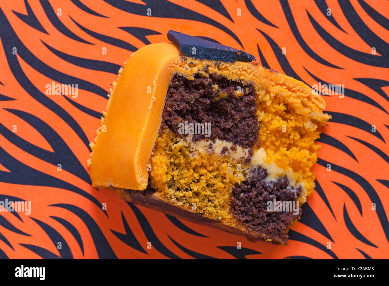 Slice of M&S Let's celebrate with Timmy the Tiger cake set on tiger ...