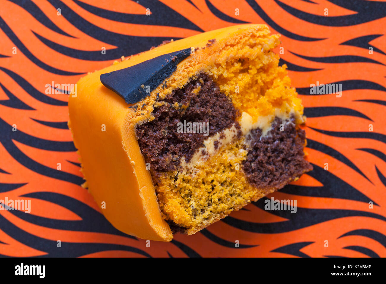 Slice of M&S Let's celebrate with Timmy the Tiger cake set on tiger ...