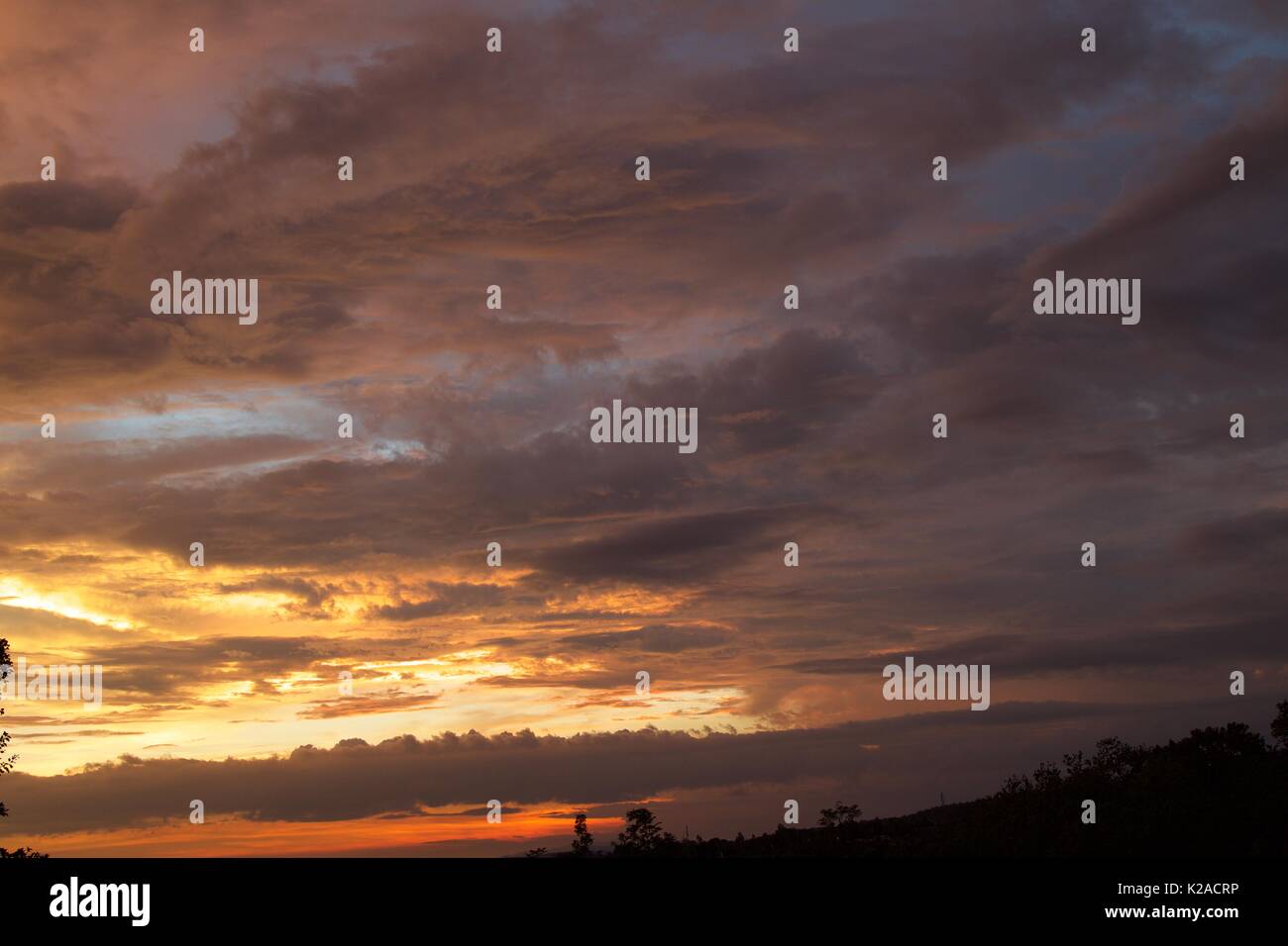 beautiful images captured of amber coloured evening sky with sunset and ...