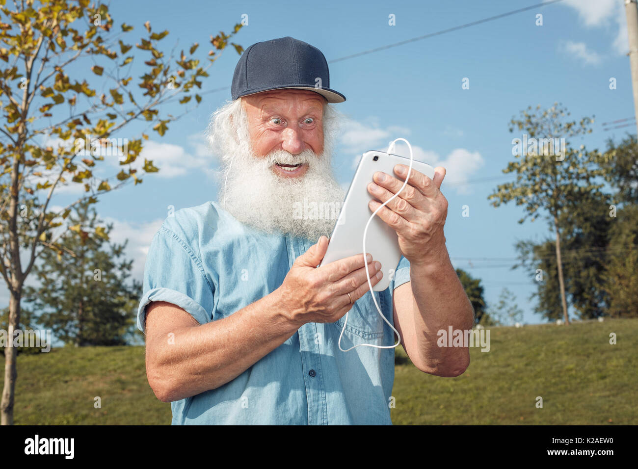 Old man talking on the phone Stock Photo - Alamy