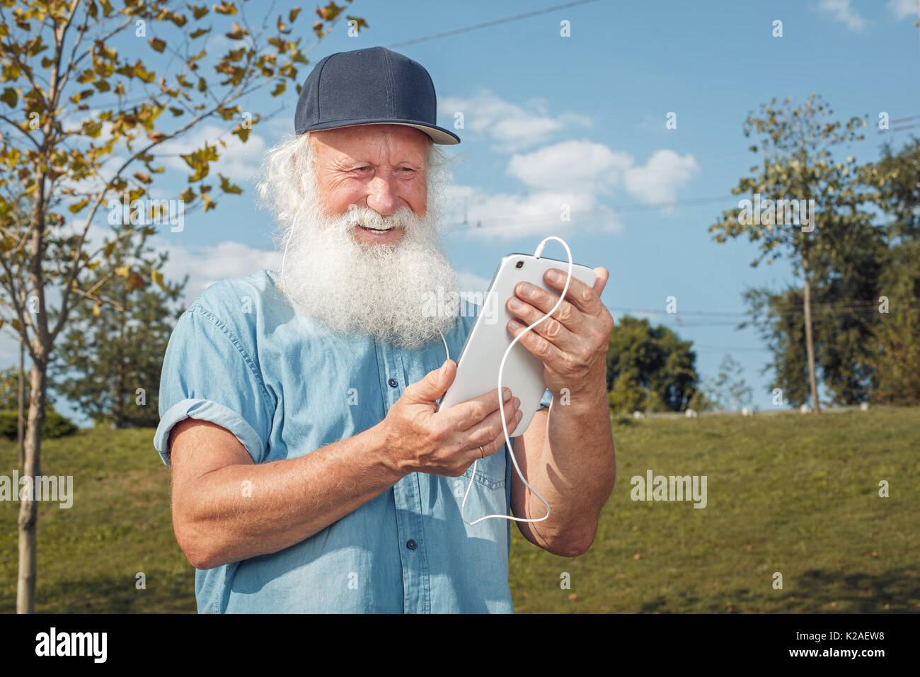 Grandpa talking on phone family hi-res stock photography and images - Alamy
