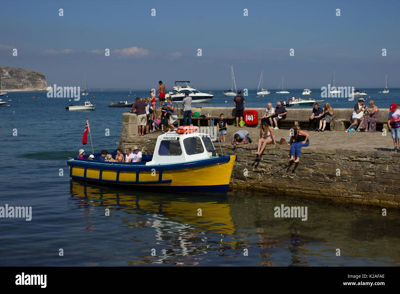 Tour boat by Stone Wall Jetty Swanage Dorset Stock Photo - Alamy