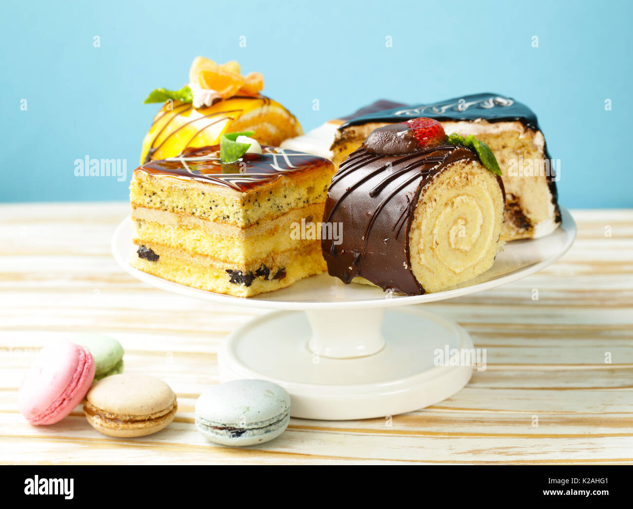 Assorted mini cakes sweet dessert, chocolate and fruit Stock Photo - Alamy