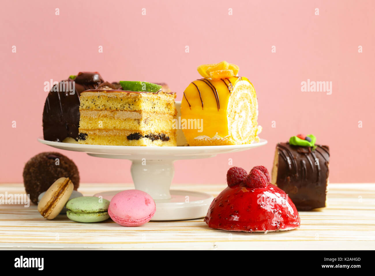 Assorted mini cakes sweet dessert, chocolate and fruit Stock Photo - Alamy