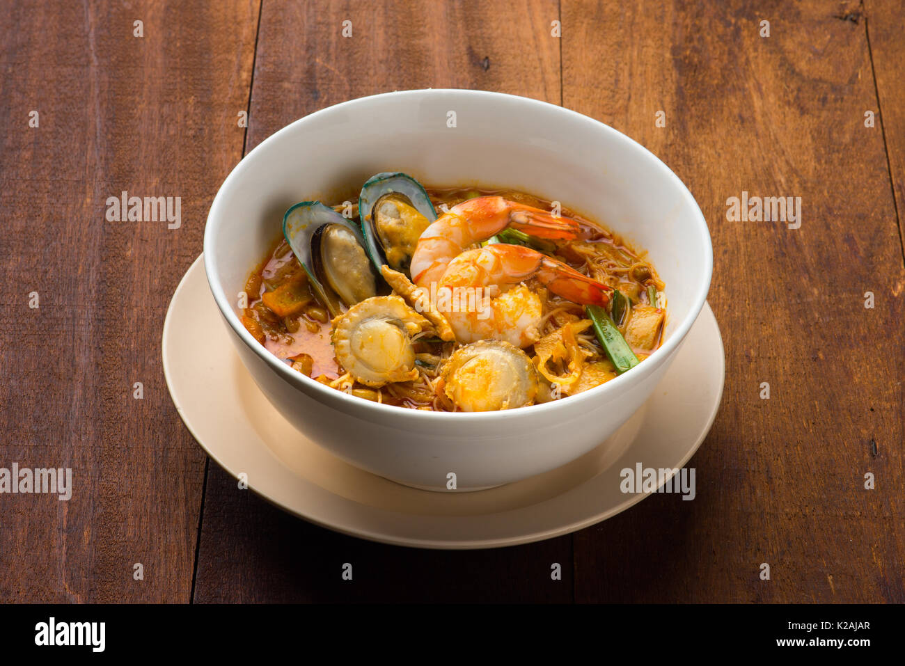 Tom Yam Koong soup with noodles Stock Photo - Alamy
