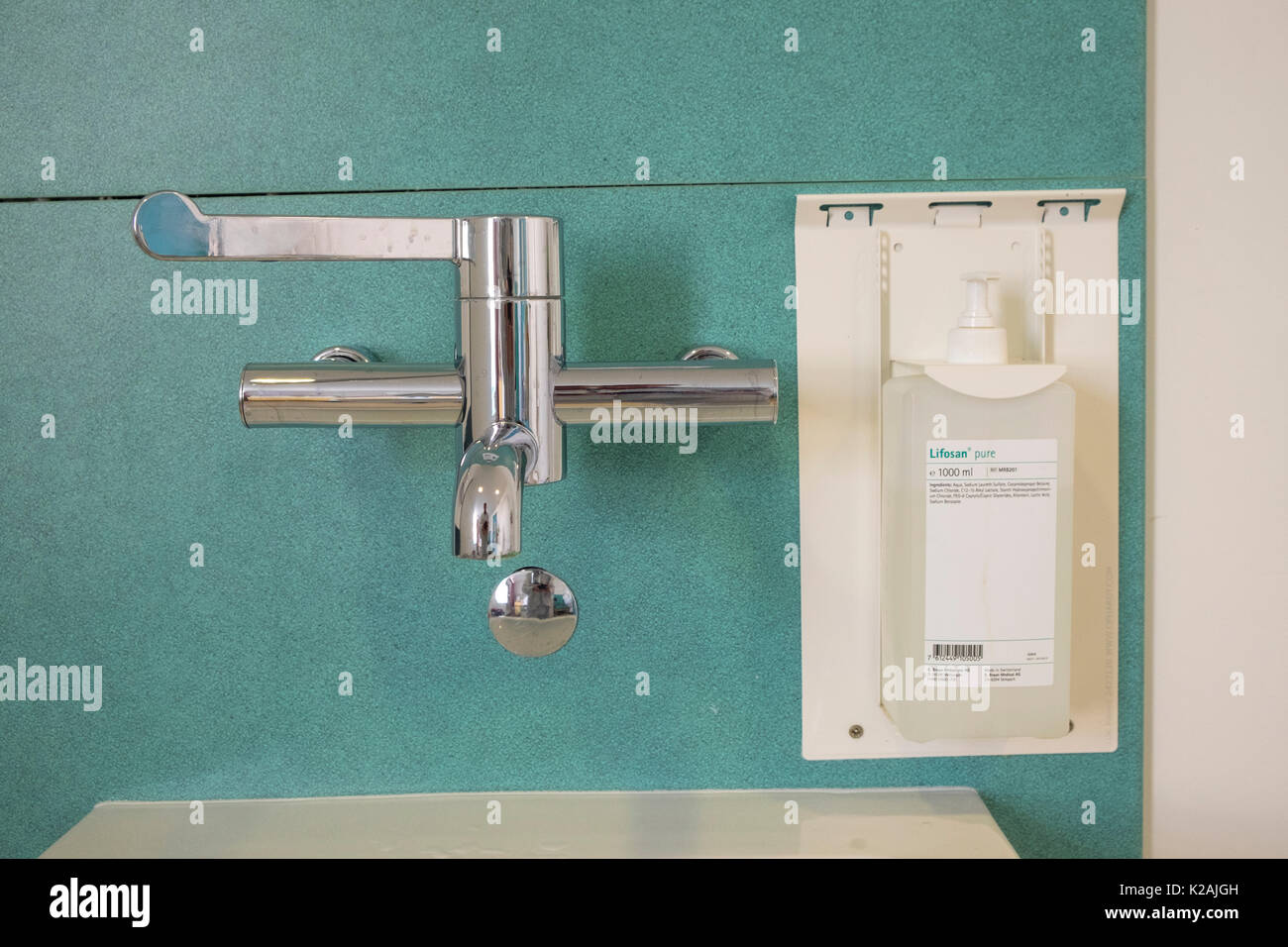 Hospital taps and soap dispenser, uk hospital Stock Photo - Alamy