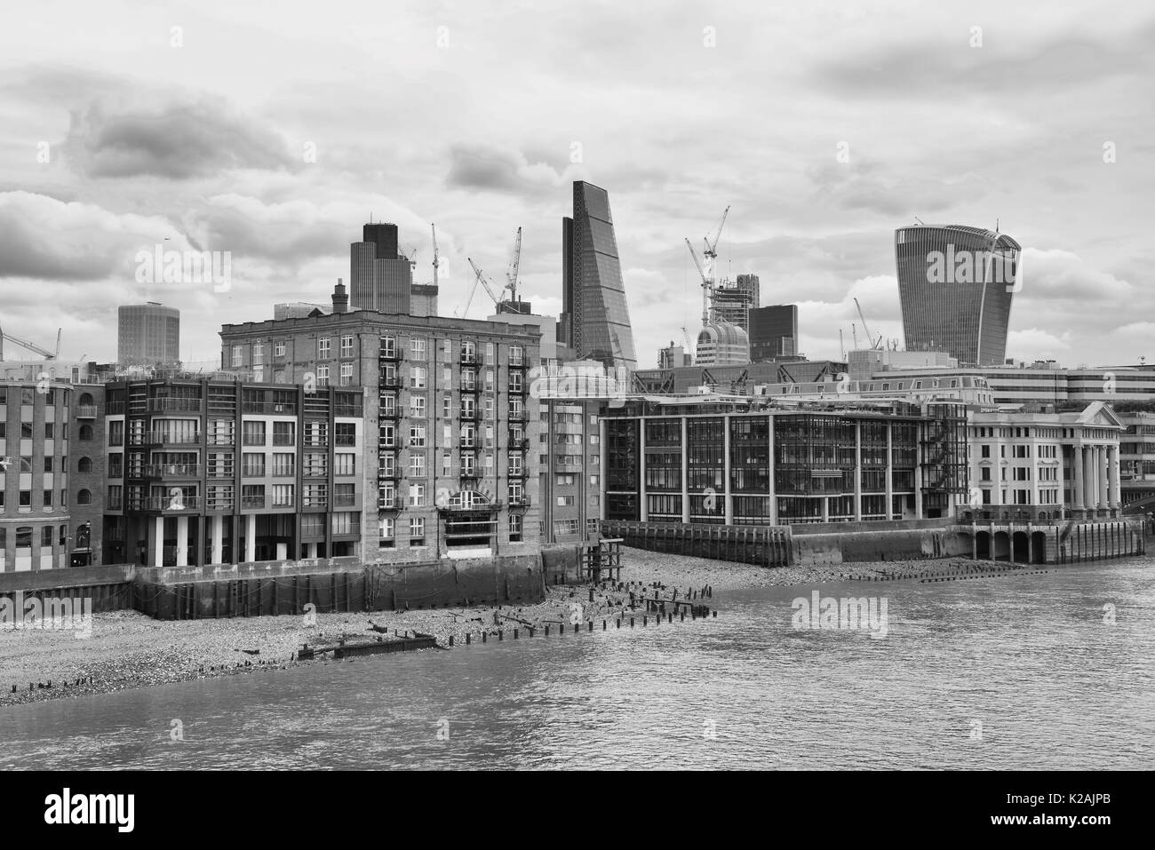 Riverside buildings and the skyline of The City of London Stock Photo ...