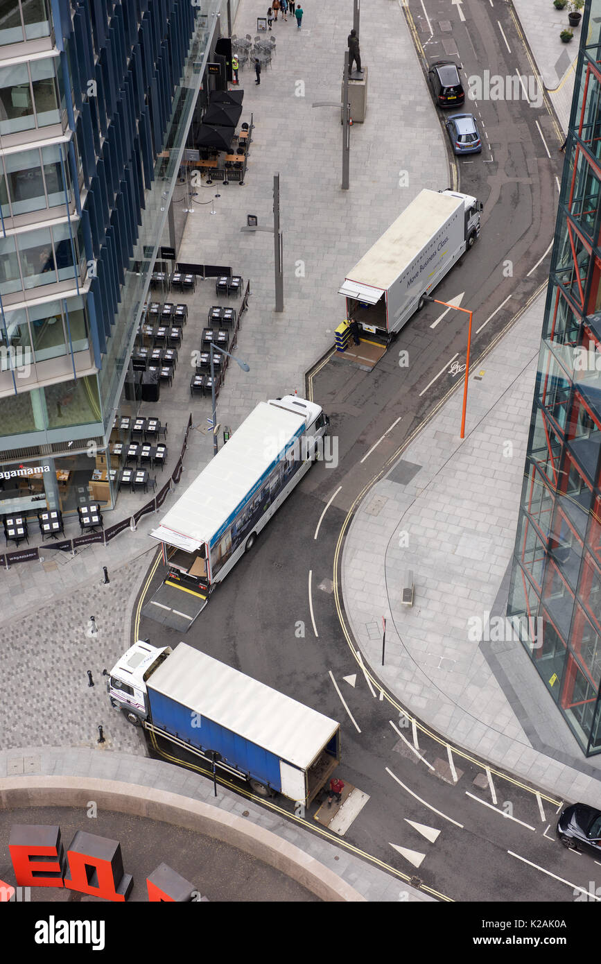 Aerial view of trucks unloading/loading in the streets of London Stock ...